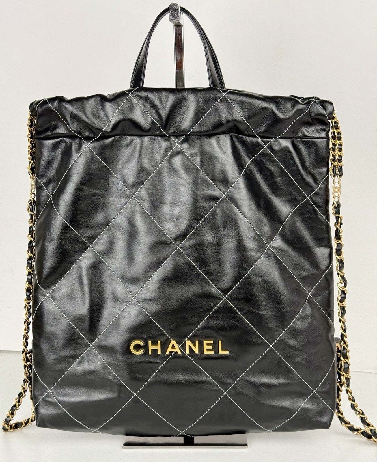 Shiny Calfskin Quilted Chanel 22 Backpack Black – TheBuyShop